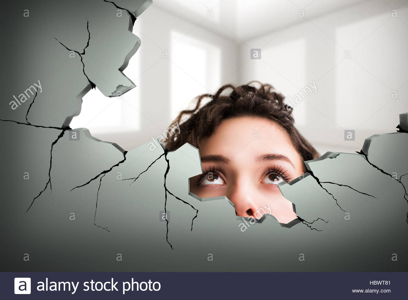 Peeking Through The Wall Stock Photos & Peeking Through The Wall Stock ...