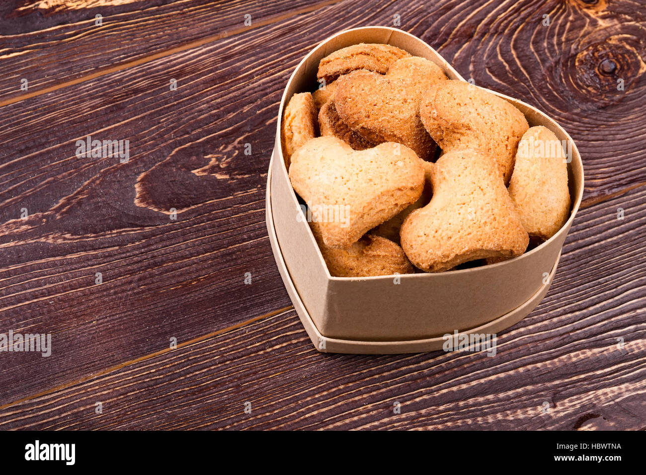 Cookies in box on wood Stock Photo - Alamy
