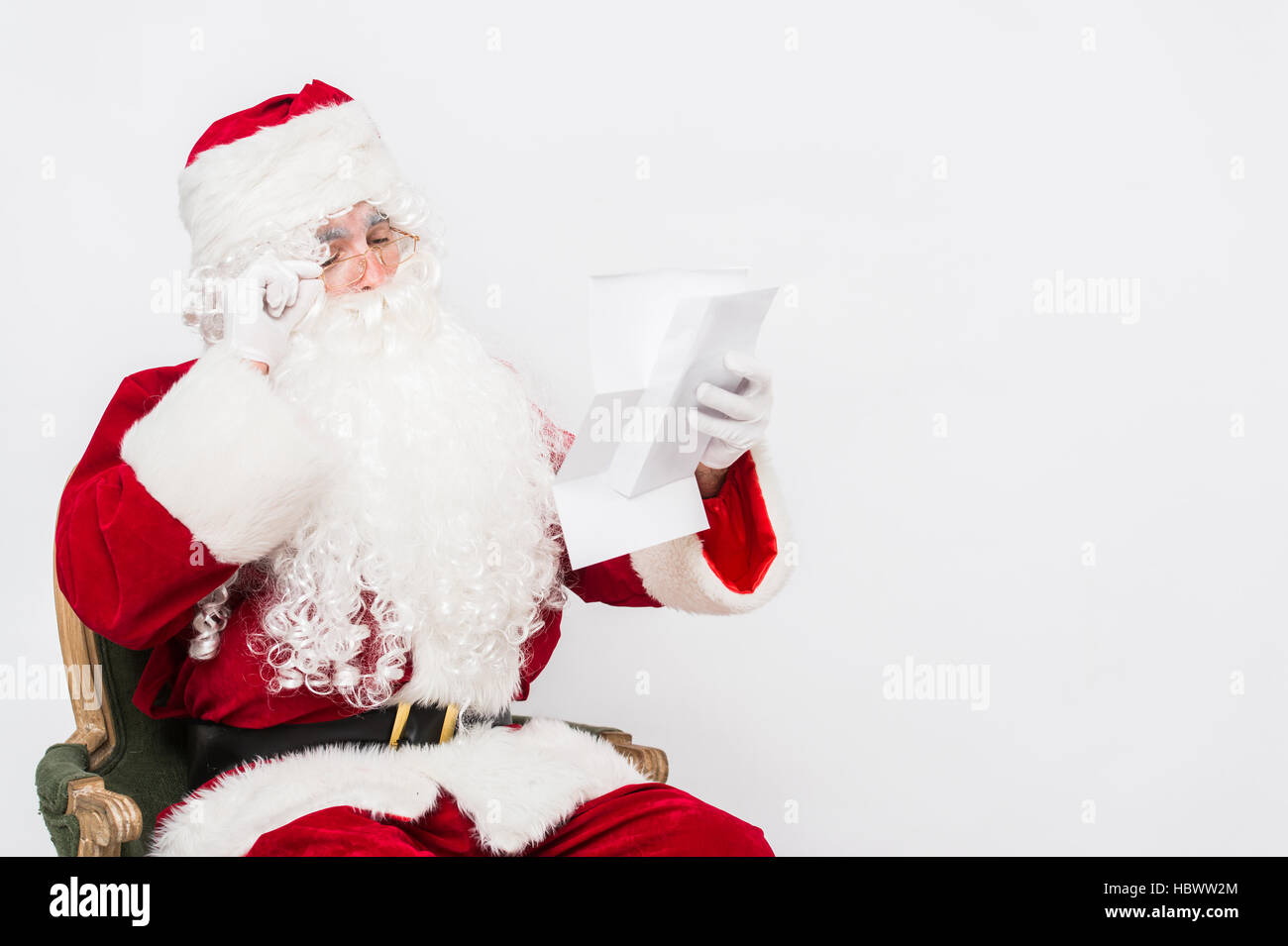 Santa Claus Reading Letter isolated over white baclground Stock Photo ...