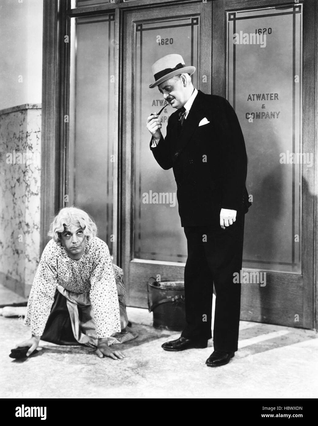 HARD TO GET, from left: Dick Powell, Thurston Hall, 1938 Stock Photo ...
