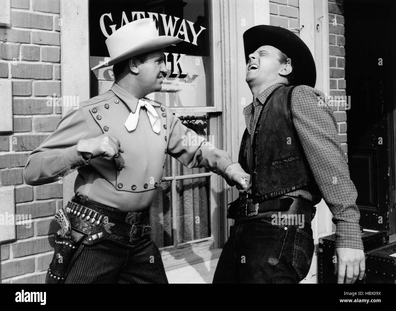 HILLS OF UTAH, from left: Gene Autry, Harry Lauter, 1951 Stock Photo ...