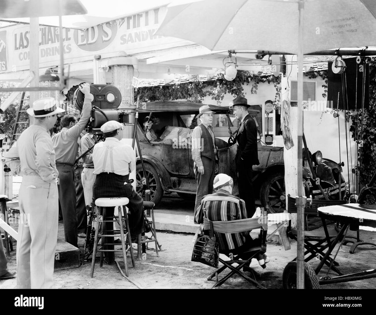 HIGH SIERRA, from left: Henry Travers, Humphrey Bogart filming on set ...