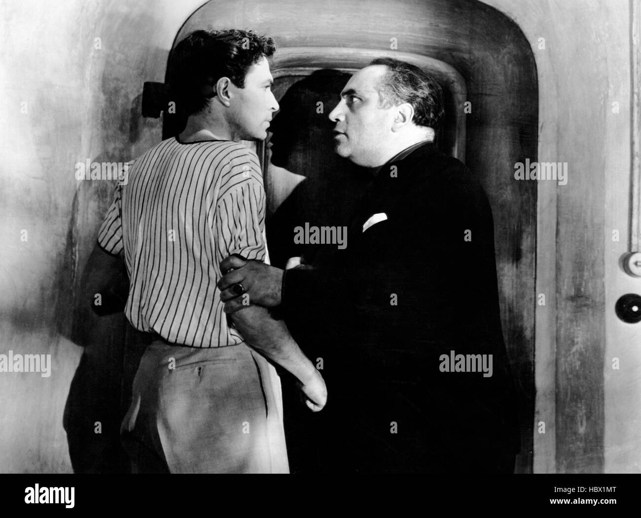 HOTEL RESERVE, from left, James Mason, Frederick Valk, 1944 Stock Photo ...