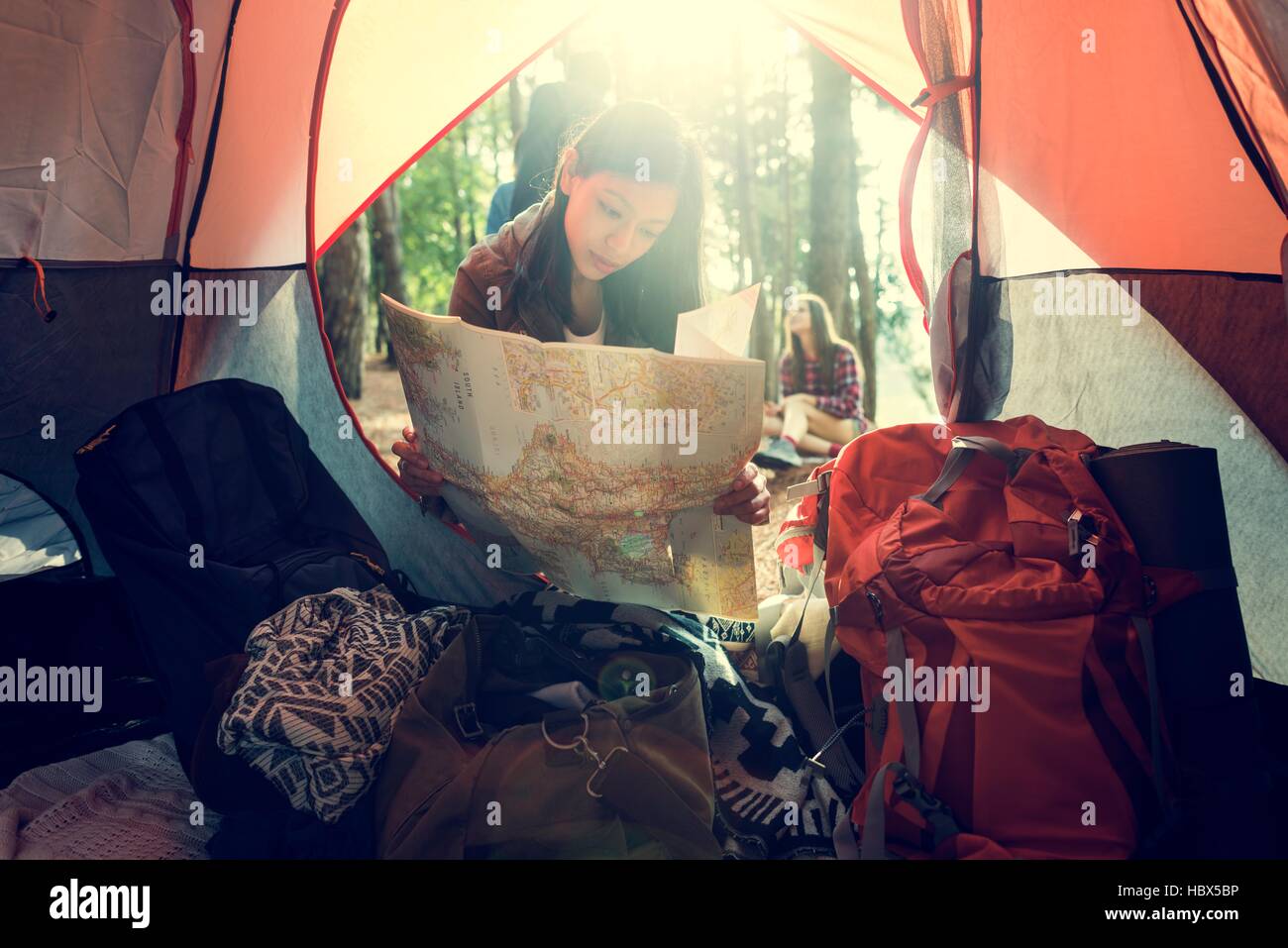 Girl Reading Map Traveling Destination Camping Concept Stock Photo - Alamy