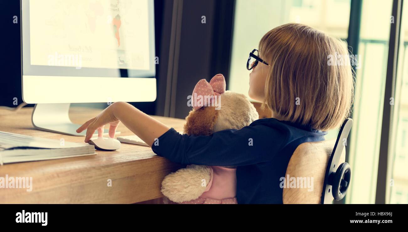 Little Girl Using Computer Concept Stock Photo - Alamy
