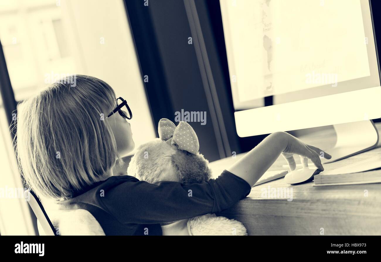 Little Girl Using Computer Concept Stock Photo - Alamy