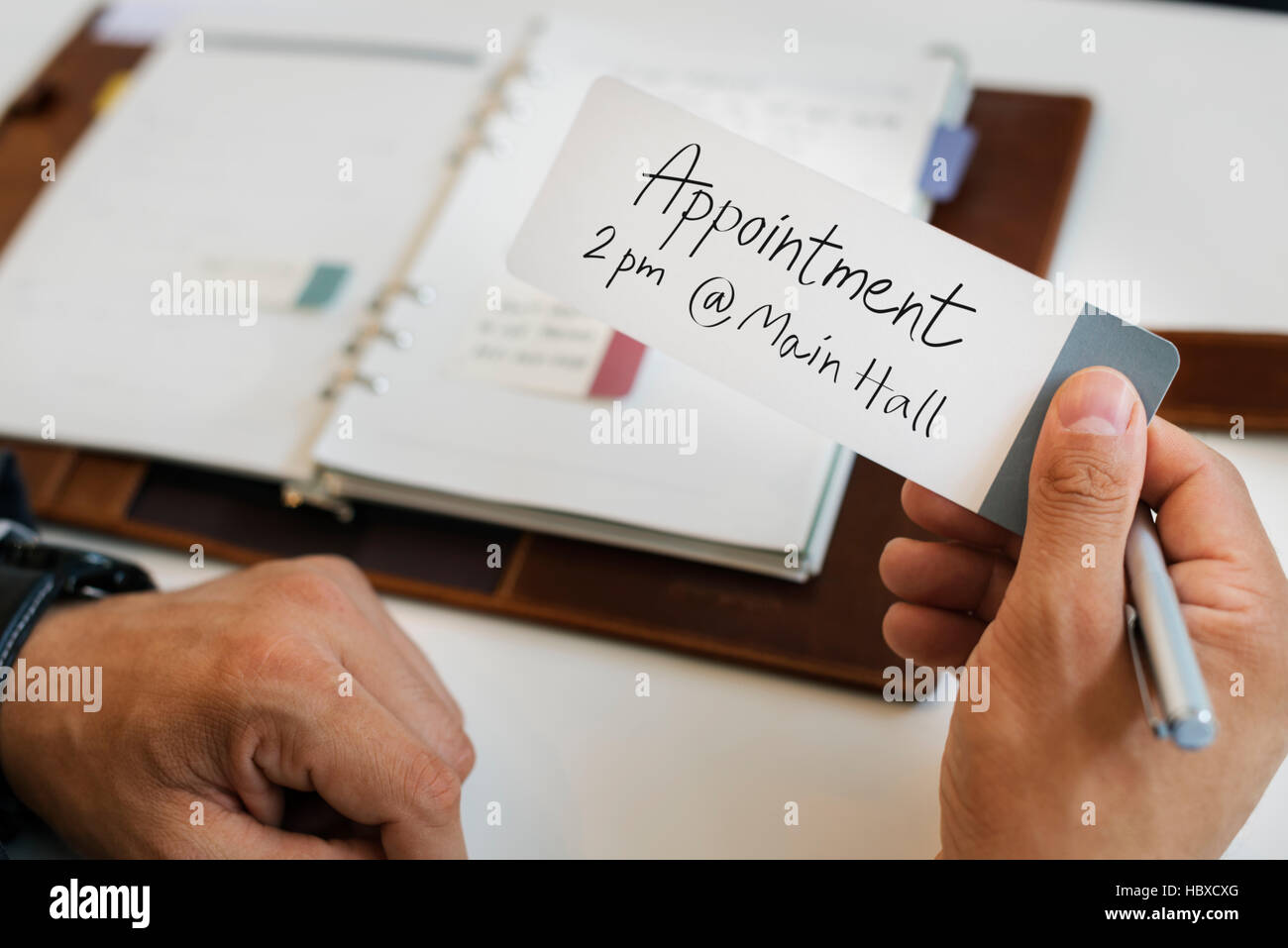 Business Man Holding Appointment Note Concept Stock Photo - Alamy