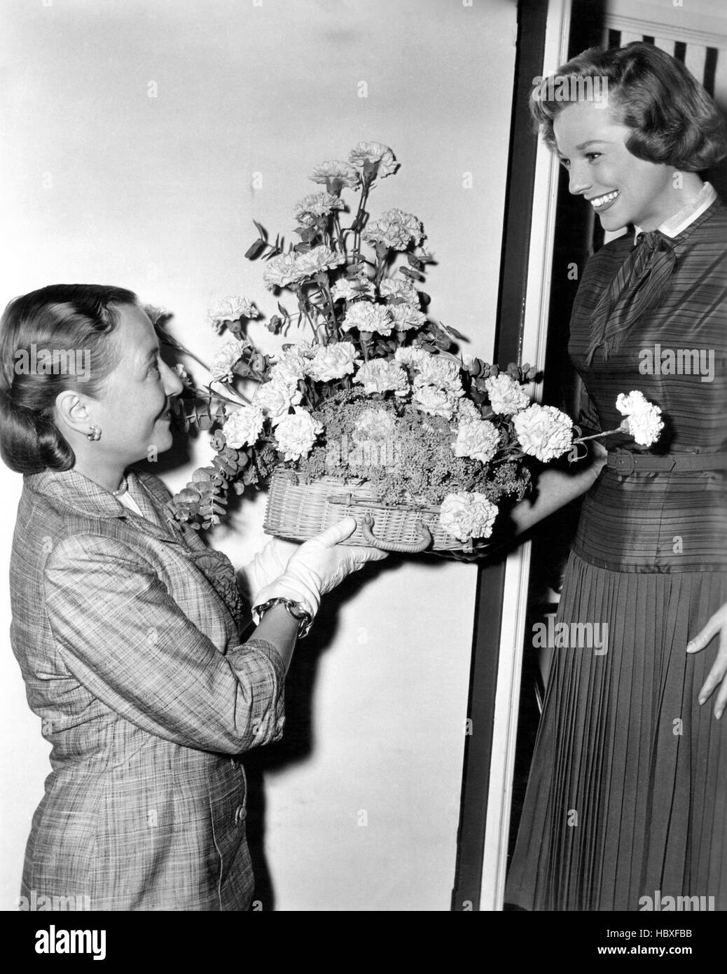 THE GLENN MILLER STORY, Helen Miller (Glenn Miller's widow), presents a ...