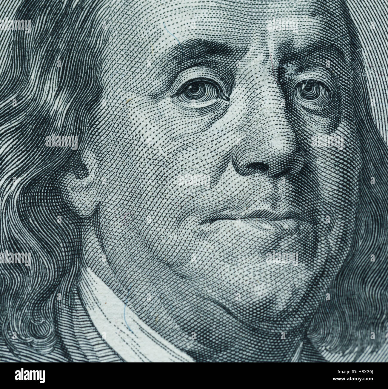 Dollars closeup. Benjamin Franklin's portrait on one hundred dollar ...