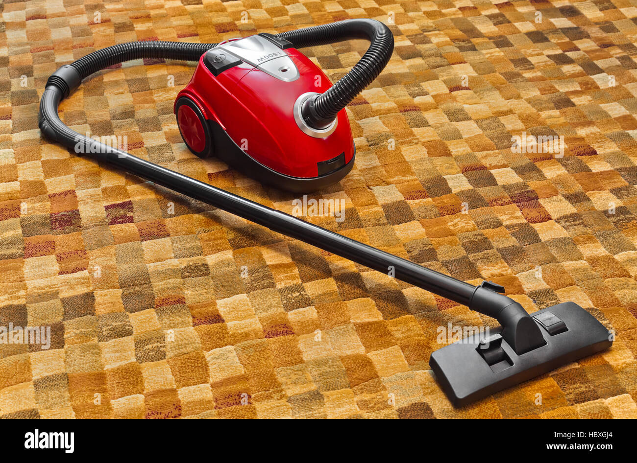 Vacuum cleaner on carpet Stock Photo - Alamy