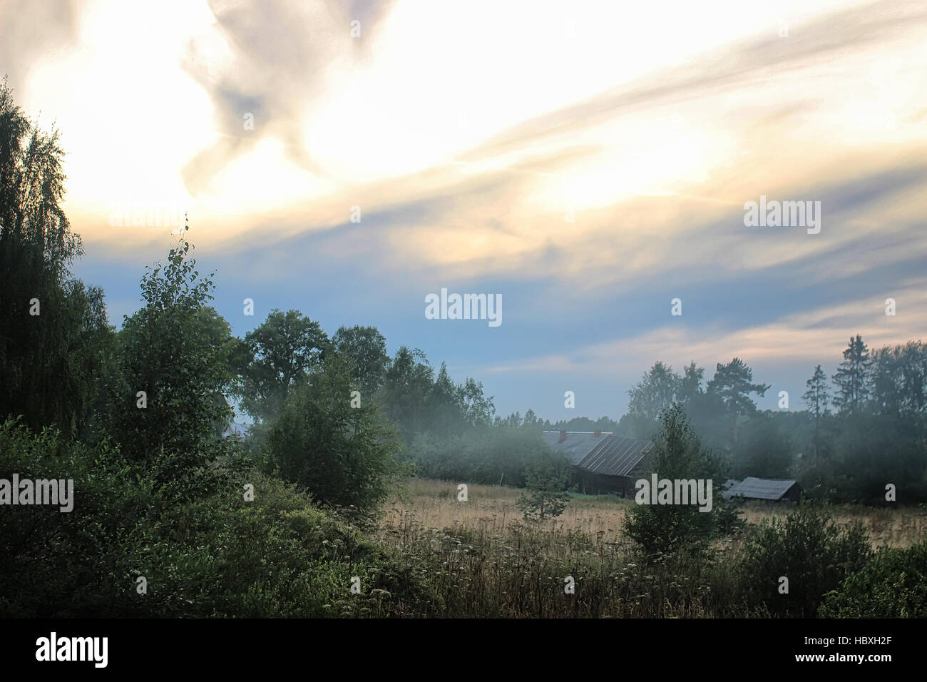 field house landscape sunset countryside Stock Photo - Alamy
