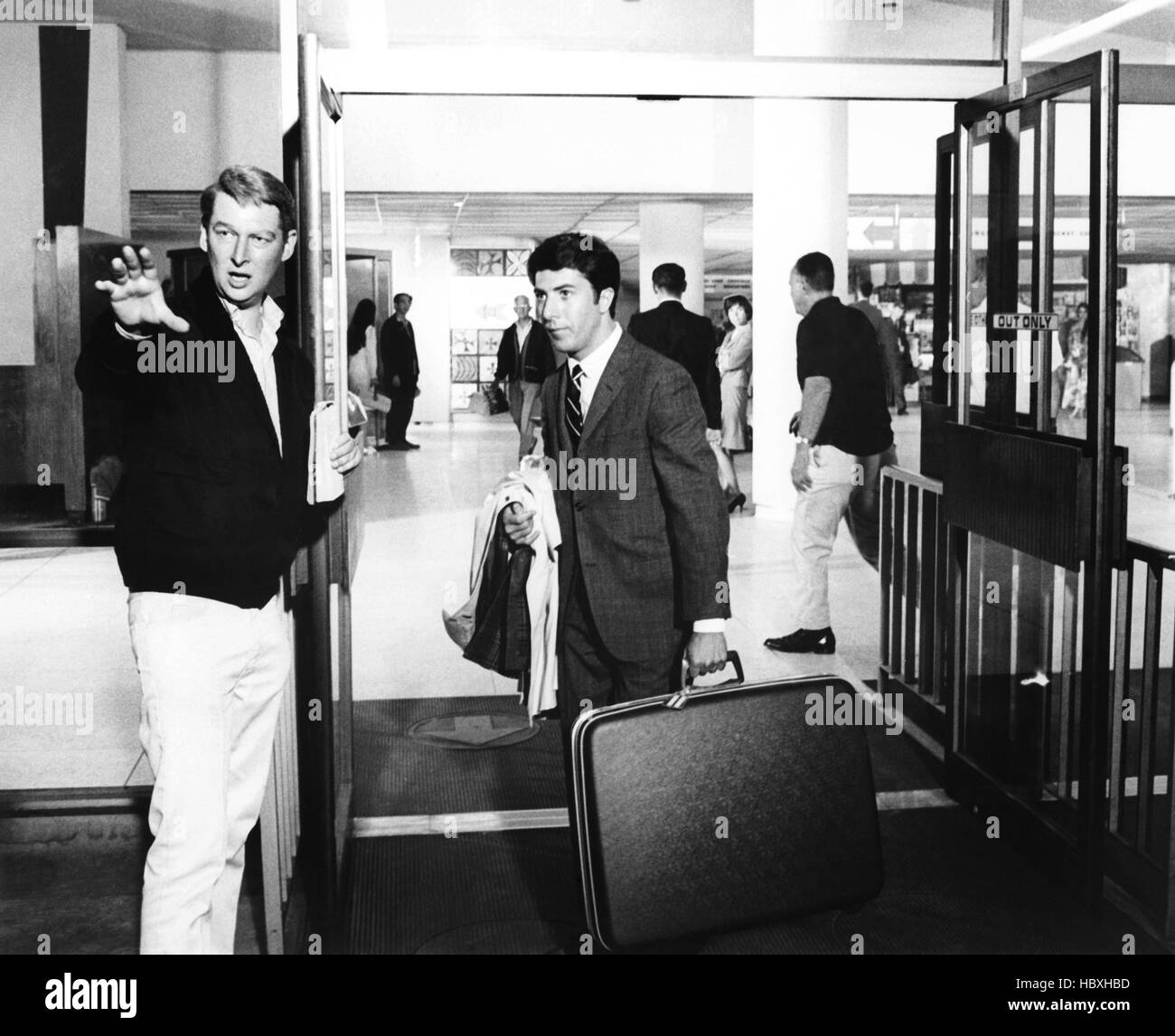 THE GRADUATE, from left, director Mike Nichols, Dustin Hoffman, on-set ...