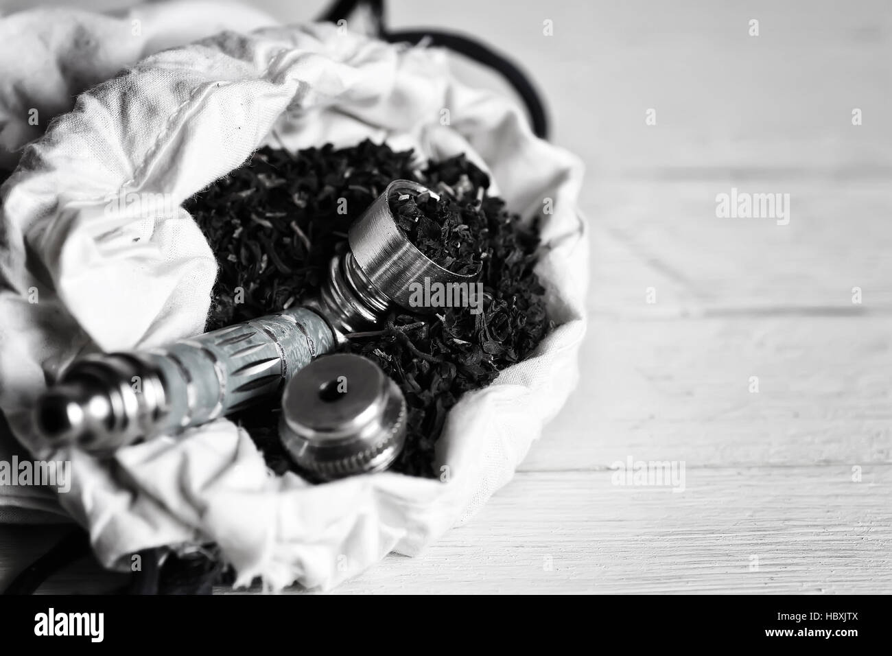 marijuana pipe on wooden background Stock Photo - Alamy