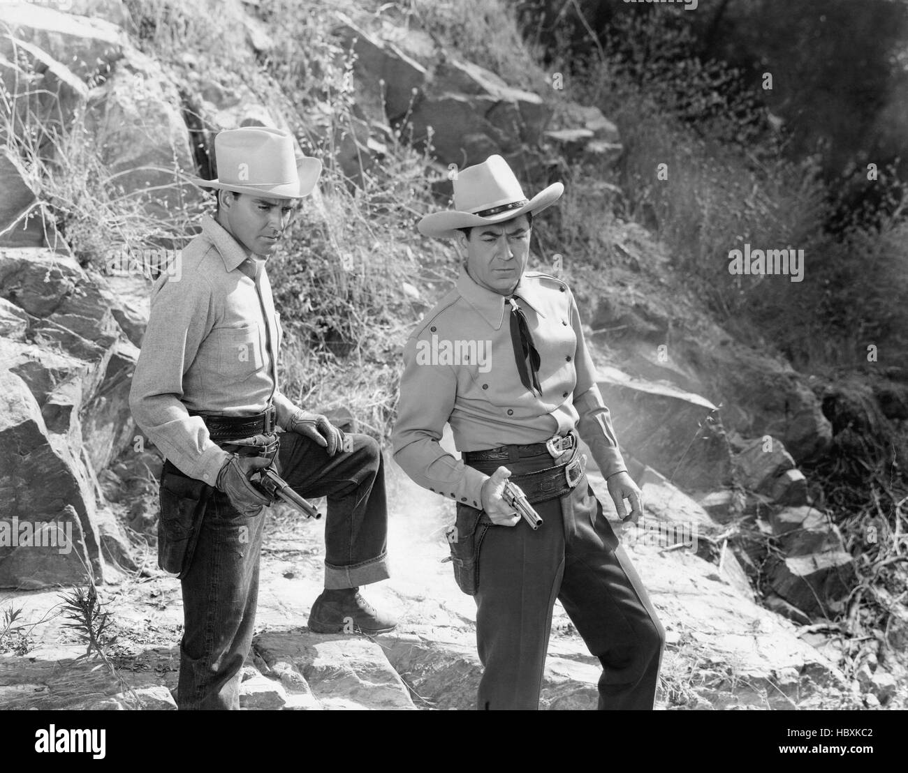 GUN SMOKE, from left: Riley Hill, Johnny Mack Brown, 1945 Stock Photo ...