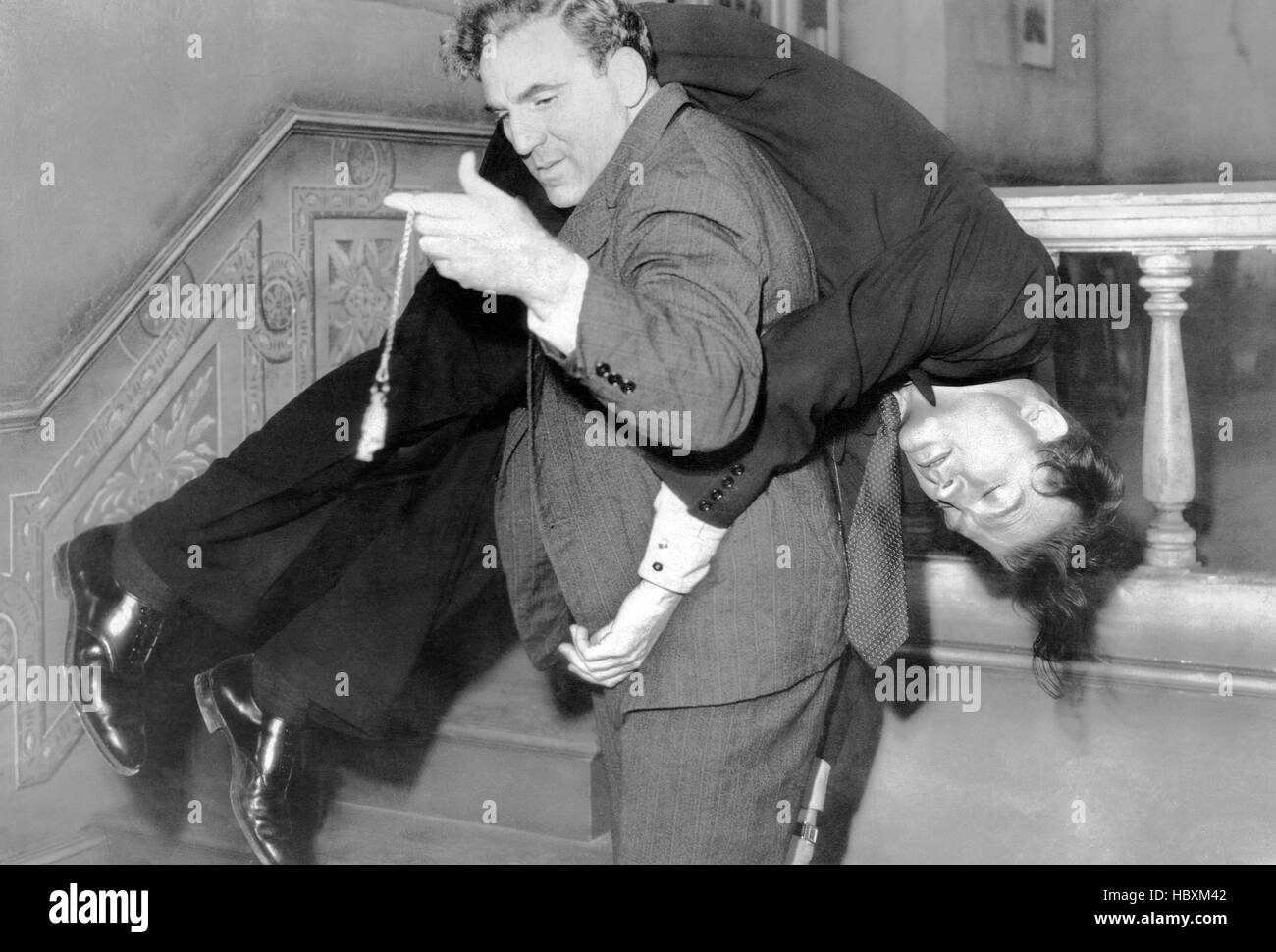 THE HAIRY APE, William Bendix, carrying John Loder, 1944 Stock Photo ...