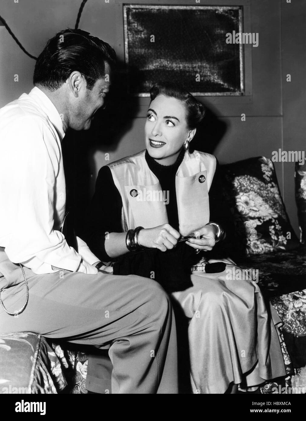 HARRIET CRAIG, from left, director Vincent Sherman, Joan Crawford, on ...