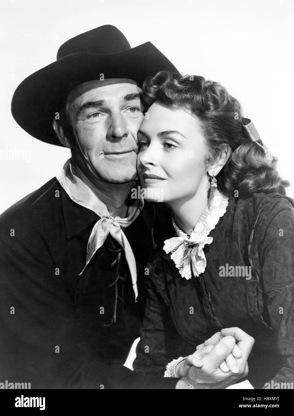 HANGMAN'S KNOT, from left: Randolph Scott, Donna Reed, 1952 Stock Photo ...