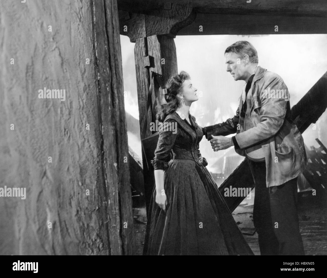 HANGMAN'S KNOT, from left: Donna Reed, Randolph Scott, 1952 Stock Photo ...