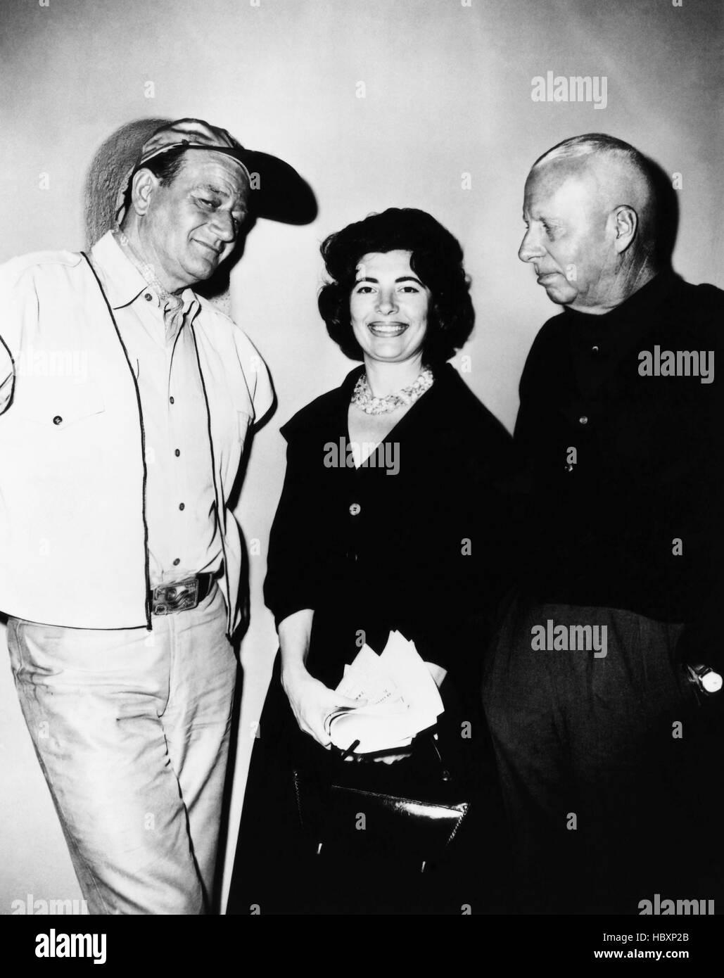 HATARI!, from left: John Wayne, actress and meorabilia dealer Peri ...