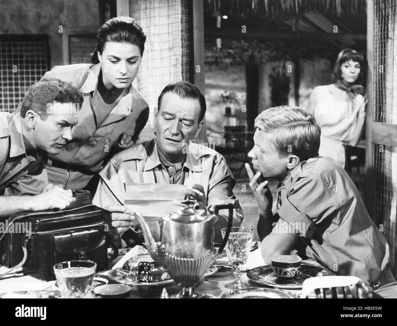 HATARI!, from left, Red Buttons, Michele Girardon, John Wayne, Hardy ...