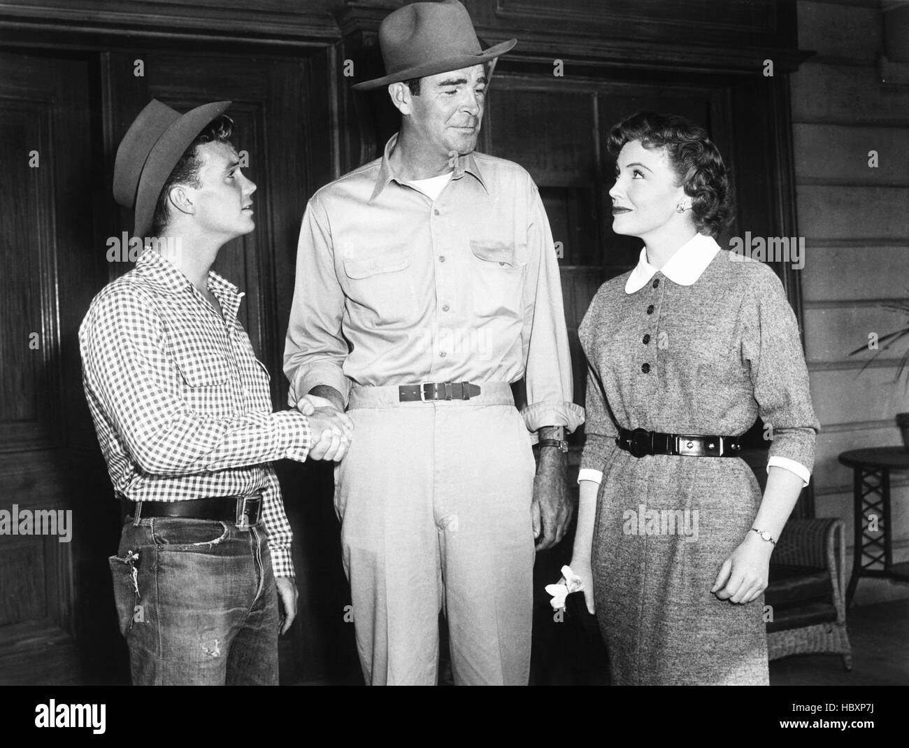 HELL'S OUTPOST, from left: Ben Cooper, Rod Cameron, Joan Leslie, 1954 Stock Photo - Alamy