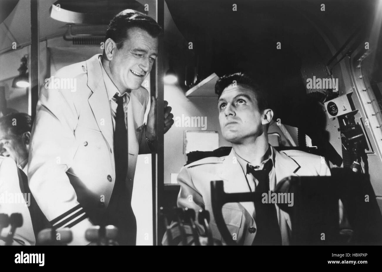 THE HIGH AND THE MIGHTY, from left: John Wayne, Robert Stack, 1954 ...