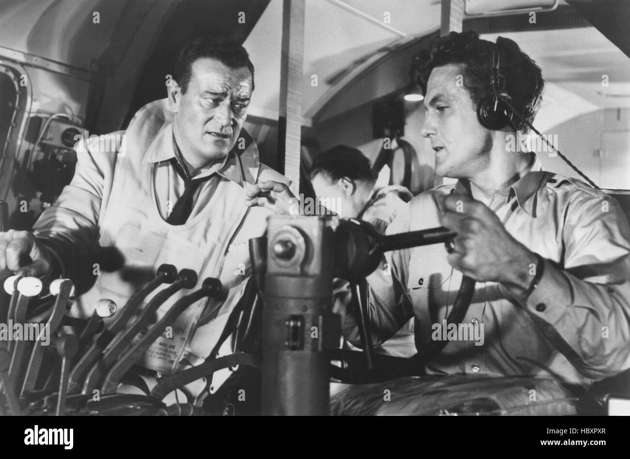 THE HIGH AND THE MIGHTY, from left: John Wayne, Robert Stack, 1954 ...