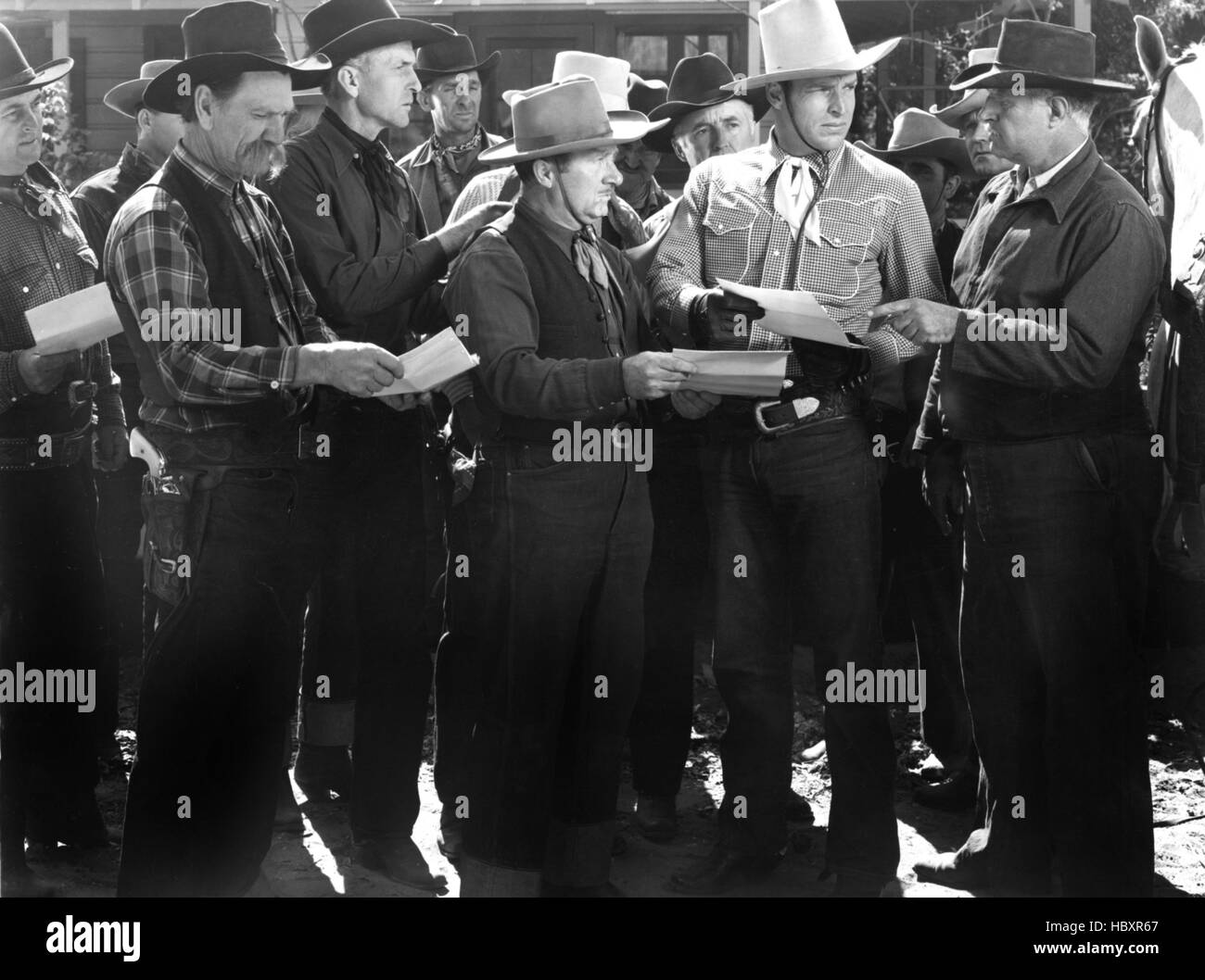 HIS BROTHER'S GHOST, Buster Crabbe (second r), 1945 Stock Photo - Alamy