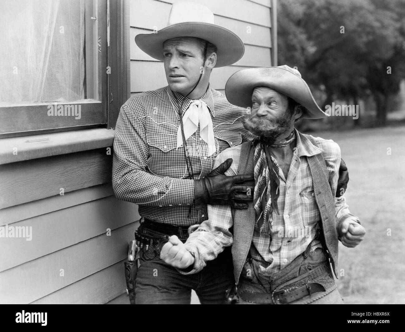 HIS BROTHER'S GHOST, from left: Buster Crabbe, Al St John, 1945 Stock ...