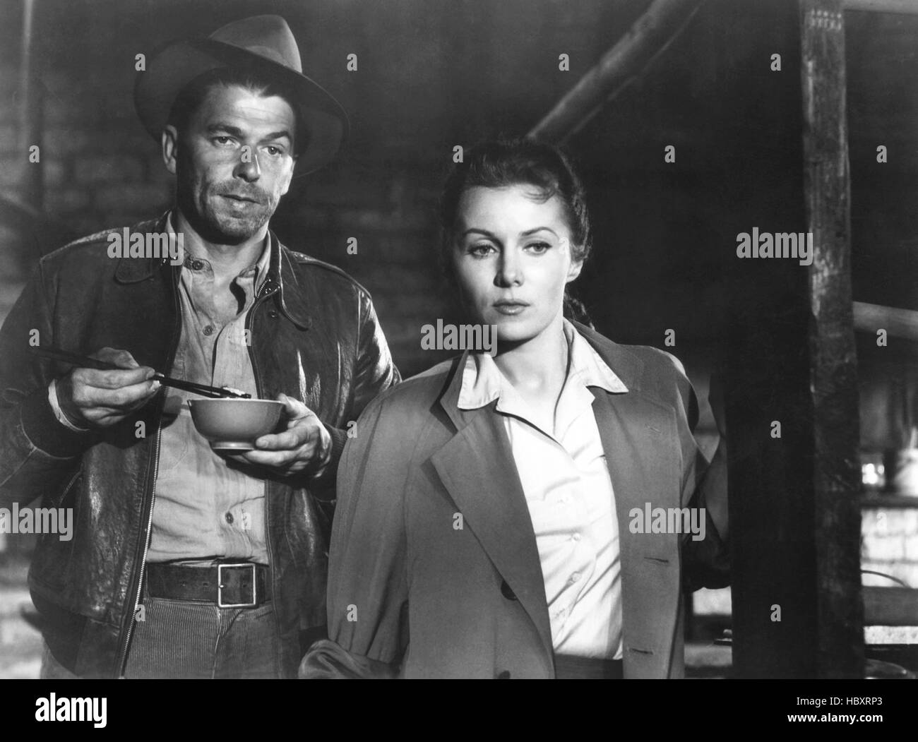 HONG KONG, from left: Ronald Reagan, Rhonda Fleming, 1952 Stock Photo ...