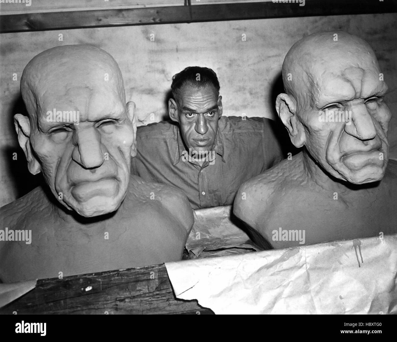 HOUSE OF HORRORS, Rondo Hatton posing with busts used in film, 1946 ...