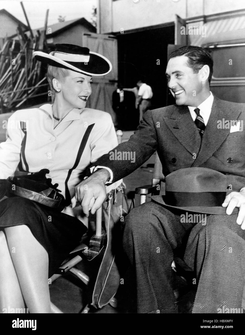 I COVER BIG TOWN, from left, Hillary Brooke, Phillip Reed, relaxing on ...