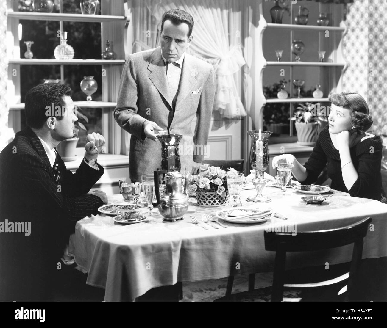IN A LONELY PLACE, from left: Frank Lovejoy, Humphrey Bogart, jeff ...
