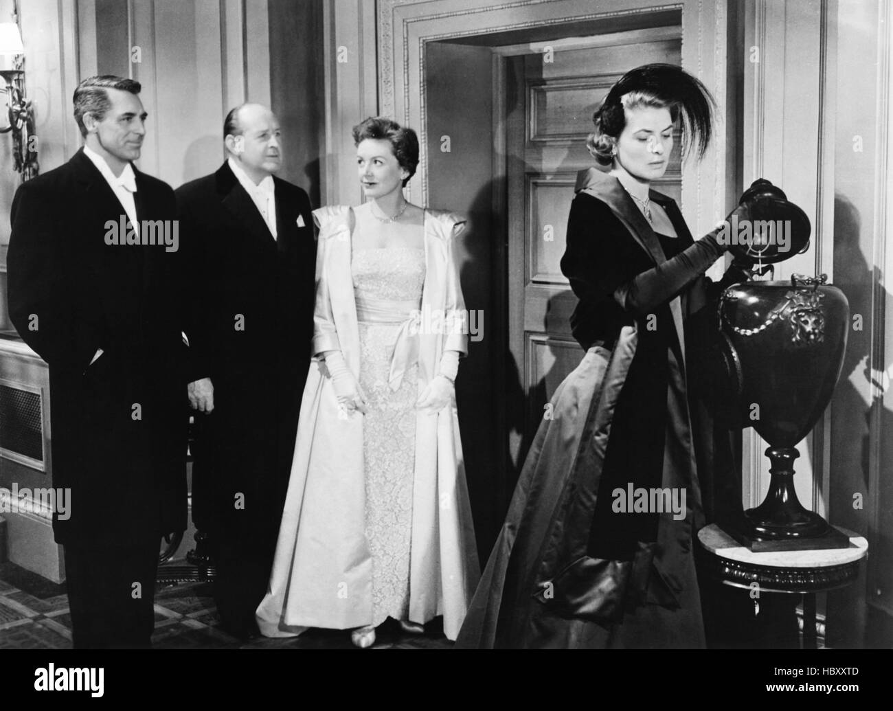 INDISCREET, from left: Cary Grant, Cecil Parker, Phyllis Calvert ...