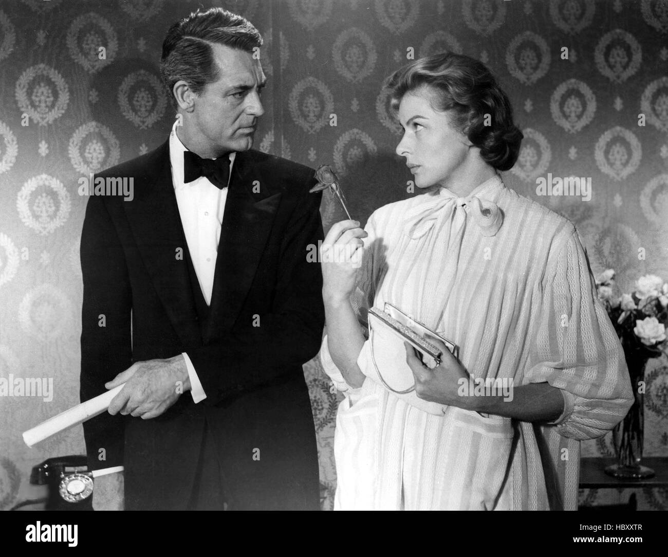 INDISCREET, Cary Grant, Ingrid Bergman, 1958, rose Stock Photo - Alamy