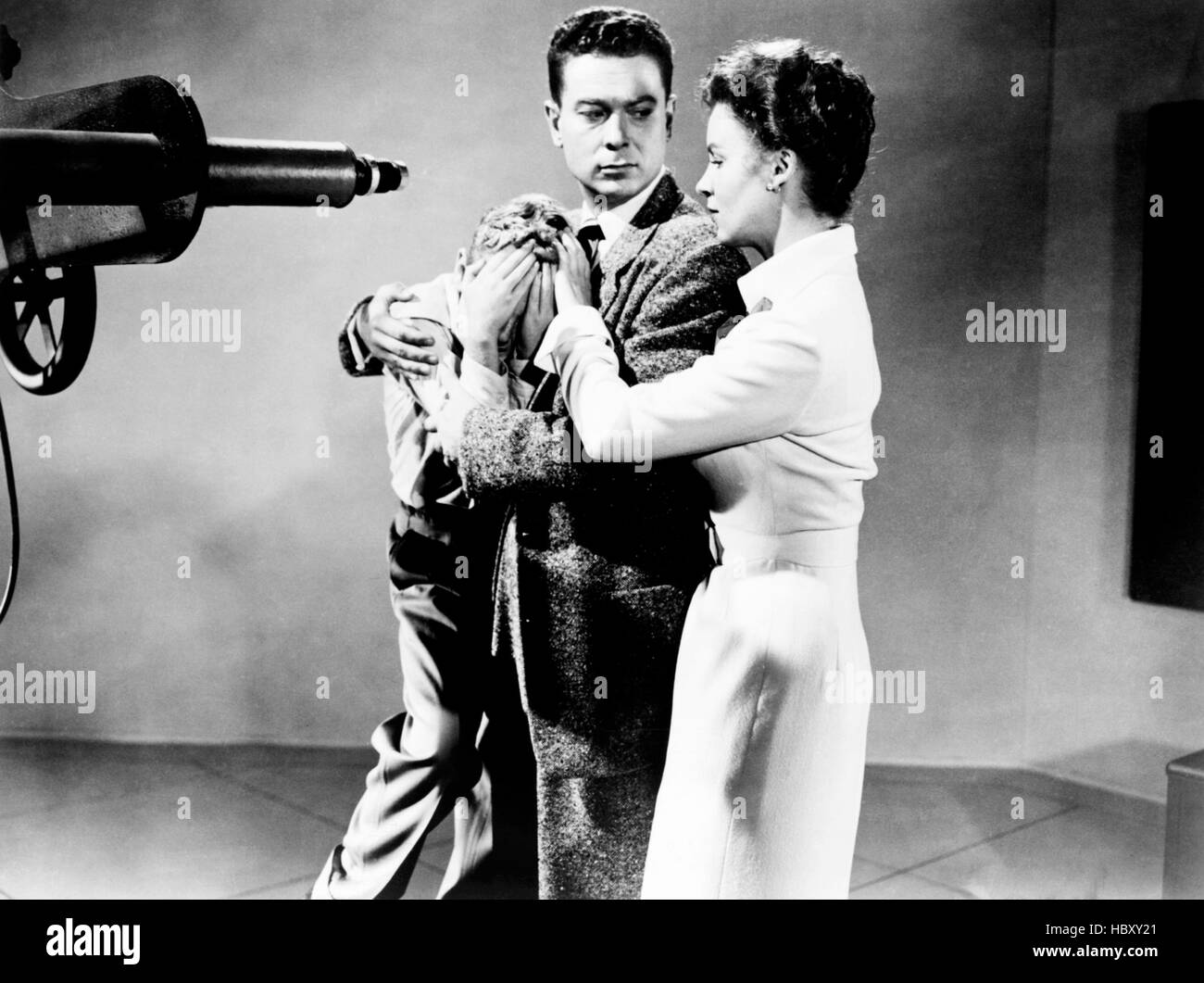 INVADERS FROM MARS, from left: Jimmy Hunt, Arthur Franz, Helena Carter ...