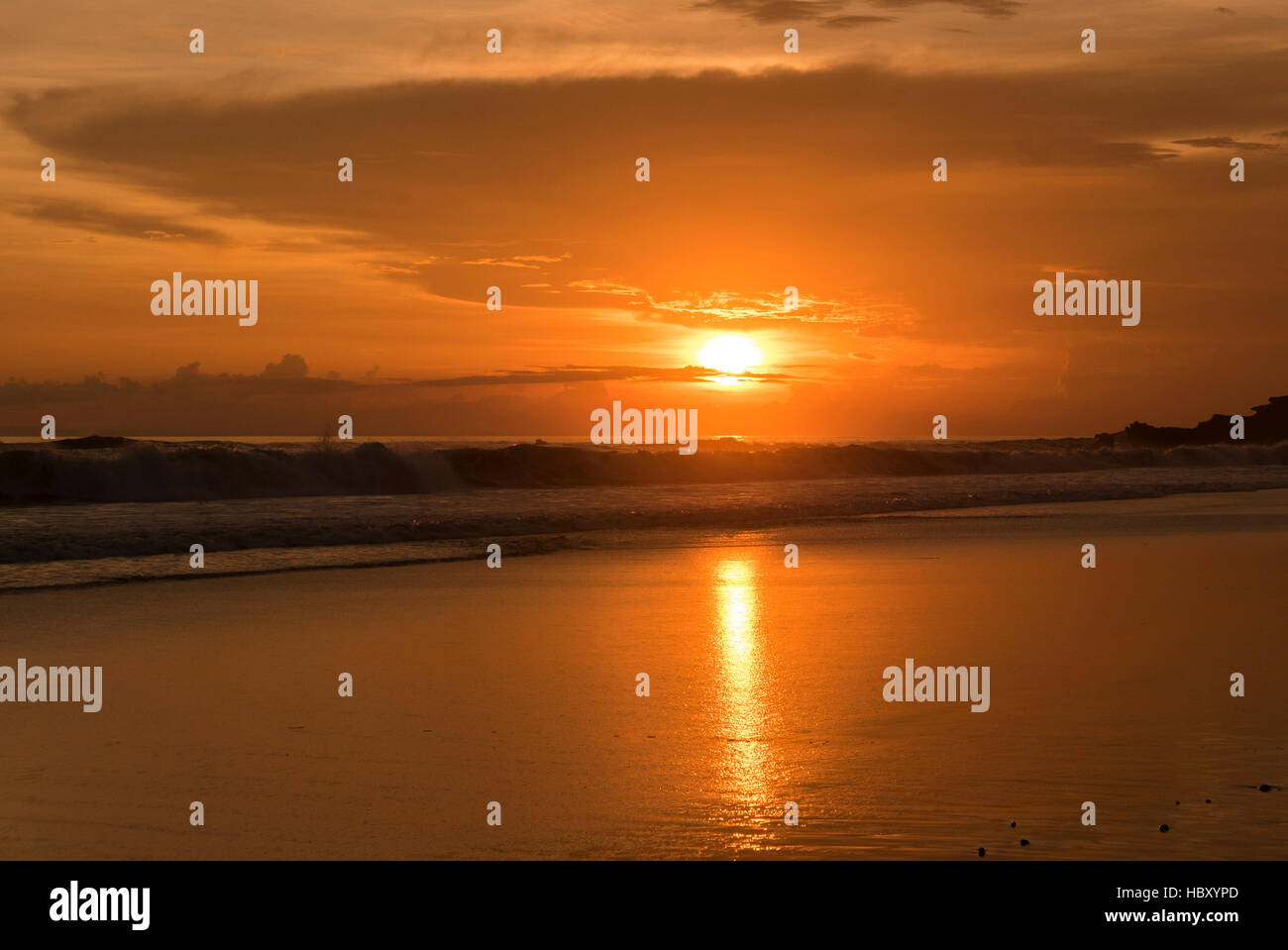 Colored sunset at Balian beach. Bali, Indonesia Stock Photo - Alamy