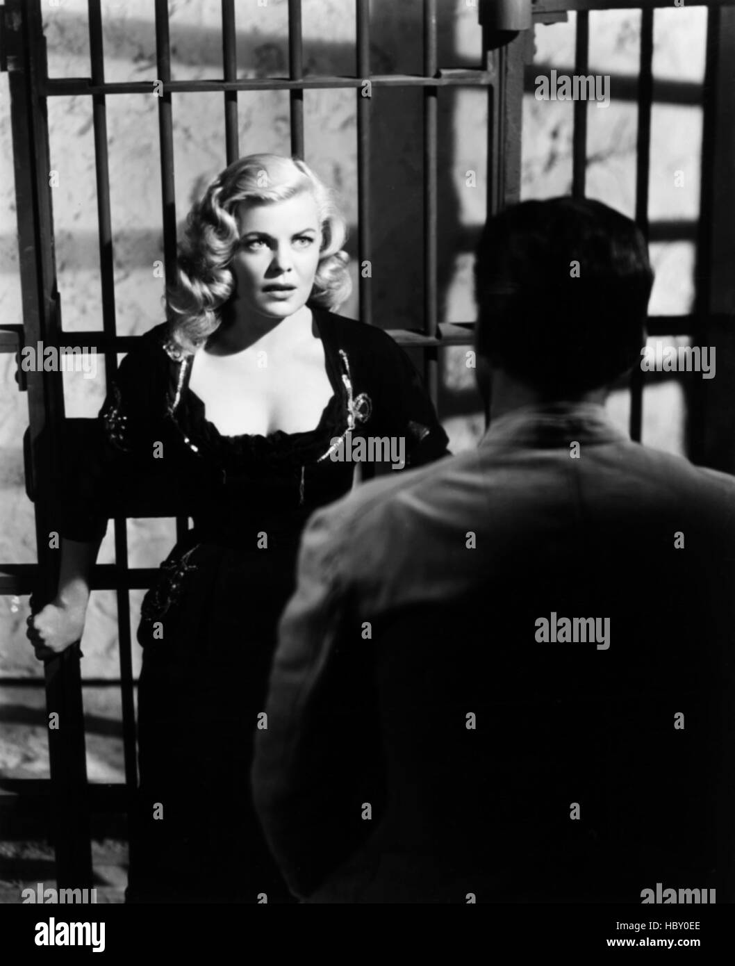 HOLD BACK TOMORROW, from left: Cleo Moore, John Agar, 1955 Stock Photo ...