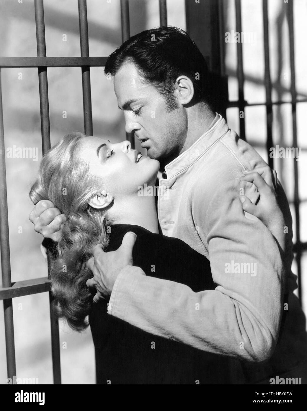 HOLD BACK TOMORROW, from left, Cleo Moore, John Agar, 1955 Stock Photo ...