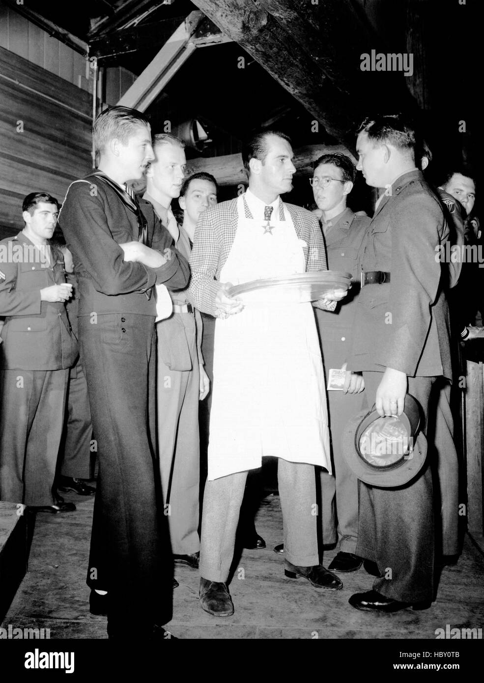 HOLLYWOOD CANTEEN, Helmut Dantine, (in apron), 1944 Stock Photo - Alamy