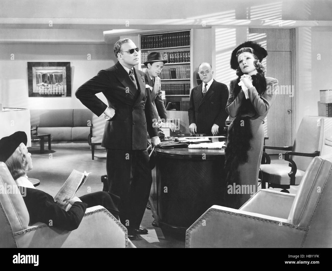 HOLLYWOOD HOTEL, from left: Glenda Farrell (seated), Alan Mowbray ...