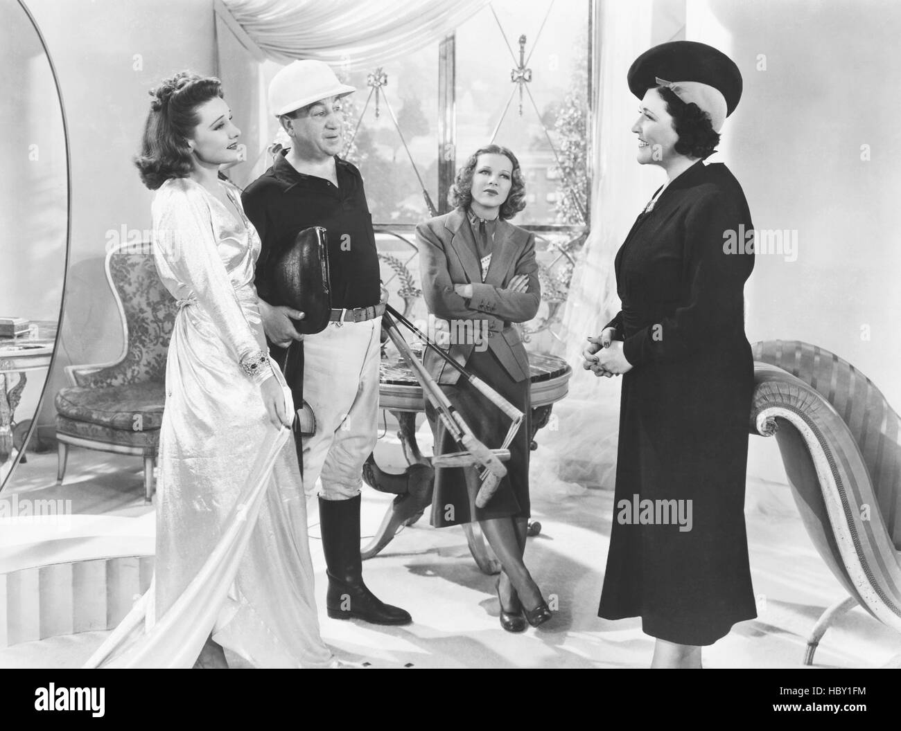 HOLLYWOOD HOTEL, from left: Lola Lane, Hugh Herbert, Glenda Farrell ...