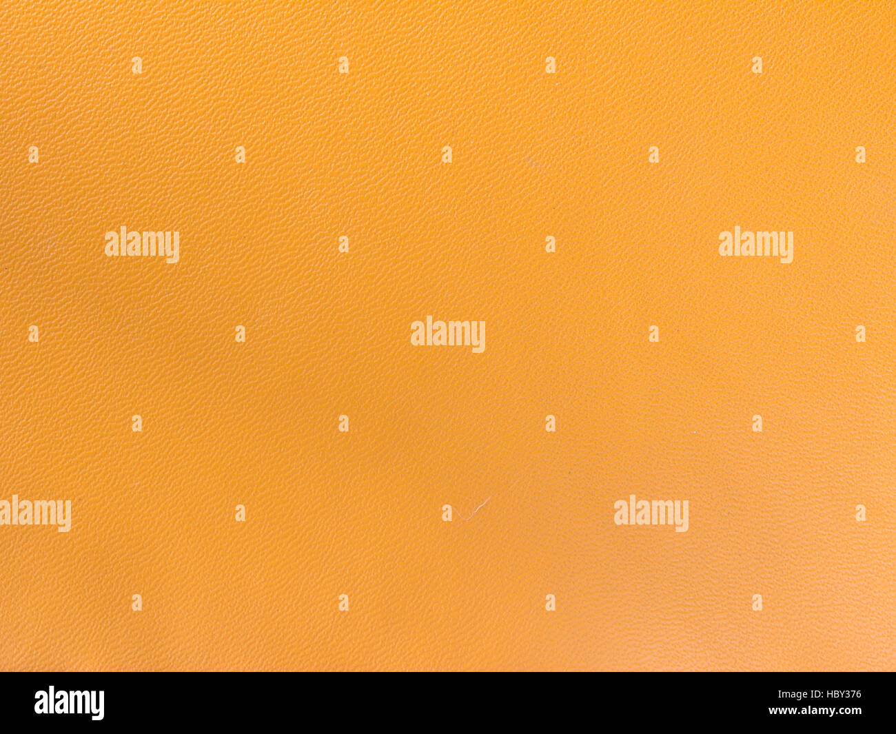 The surface of orange vinyl fabric Stock Photo - Alamy
