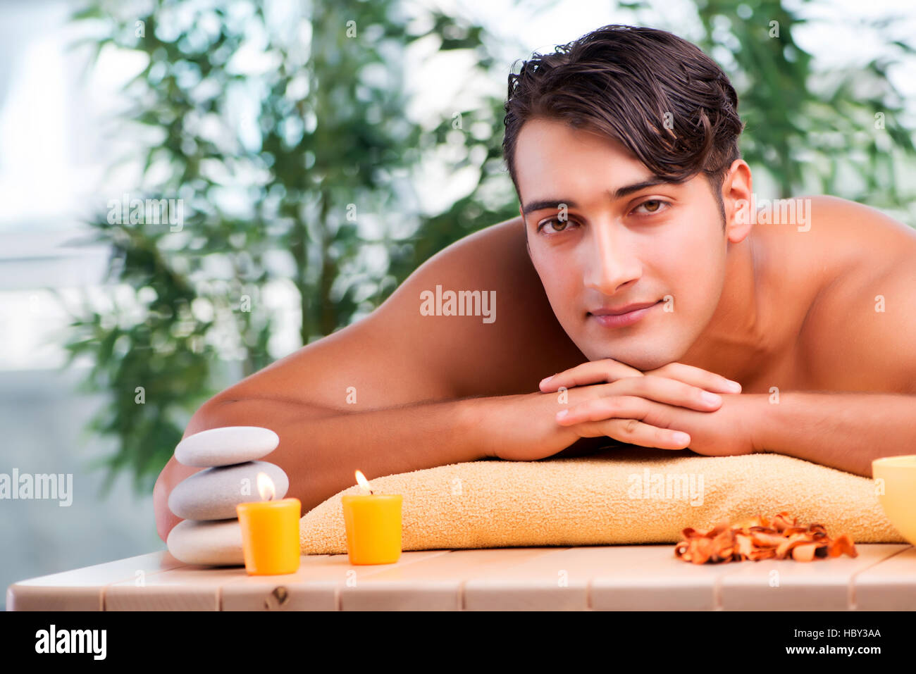 Young handsome man during spa procedure Stock Photo - Alamy