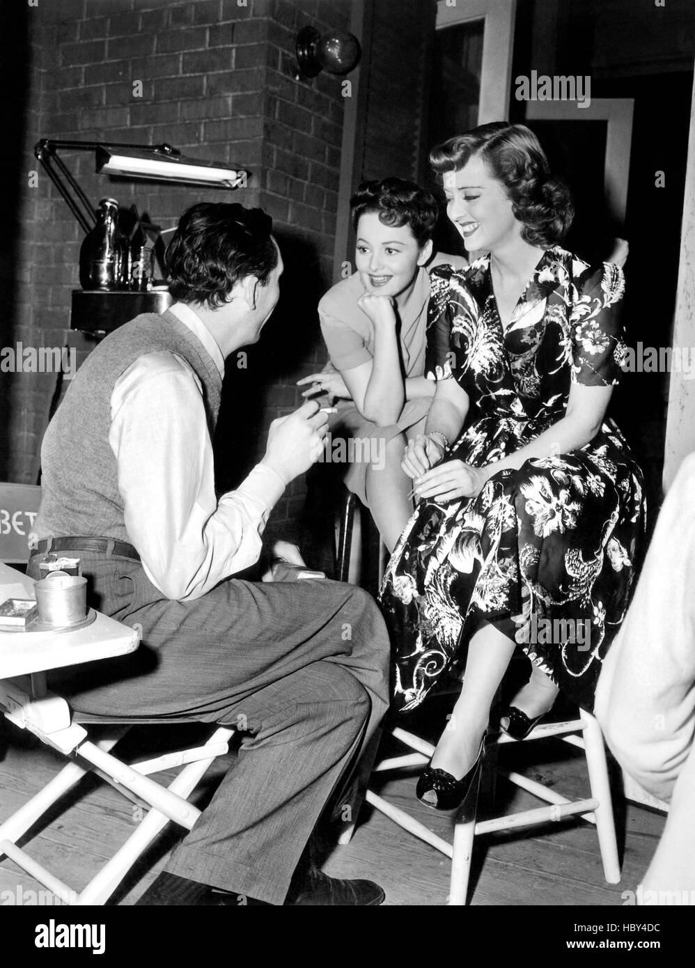 In This Our Life From Left Director John Huston Olivia De Havilland