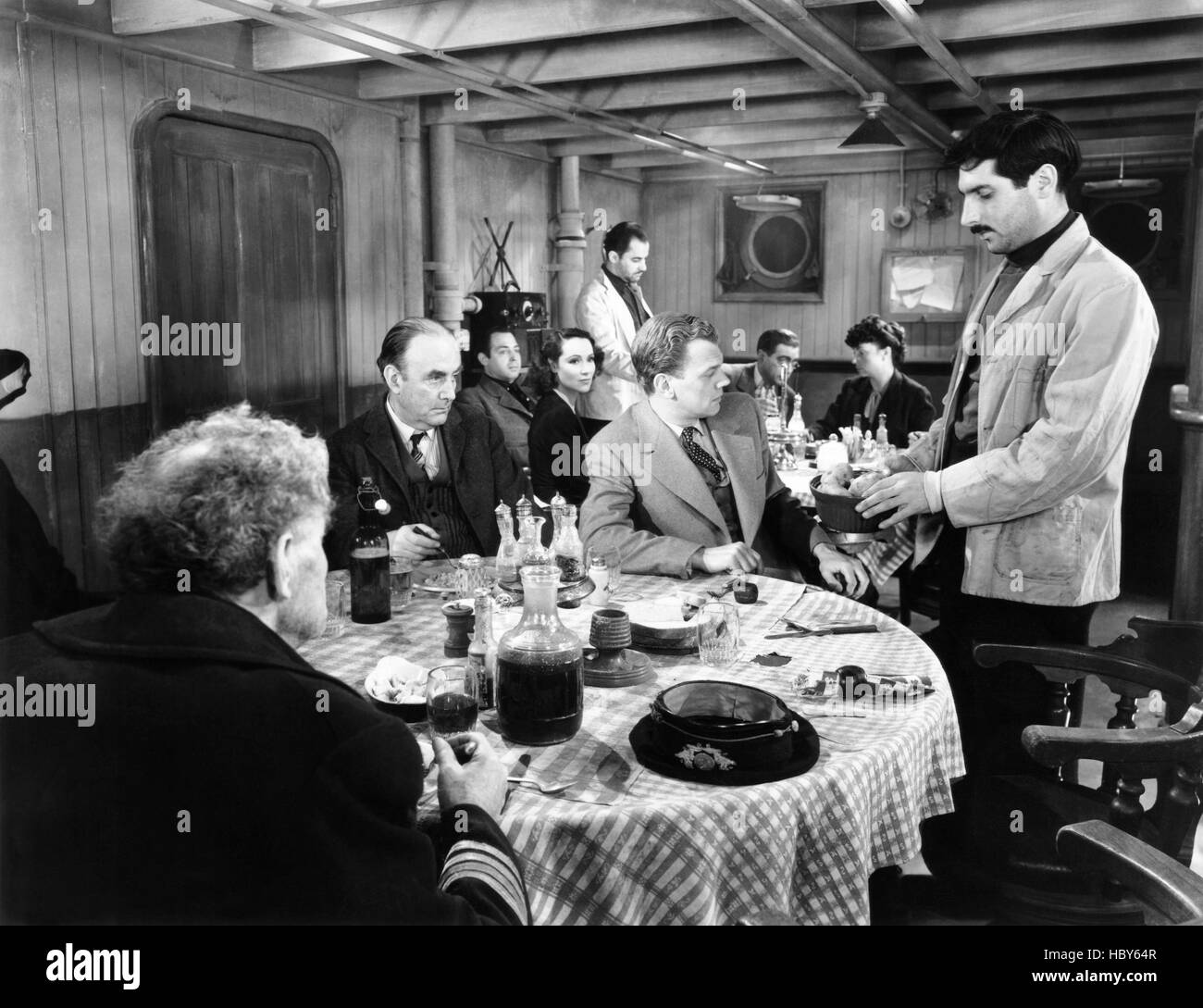 JOURNEY INTO FEAR, Joseph Cotten (center), Jack Durant (back left ...