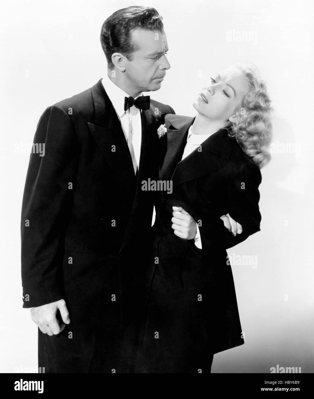 JOHNNY O'CLOCK, from left: Dick Powell, Evelyn Keyes, 1947 Stock Photo ...