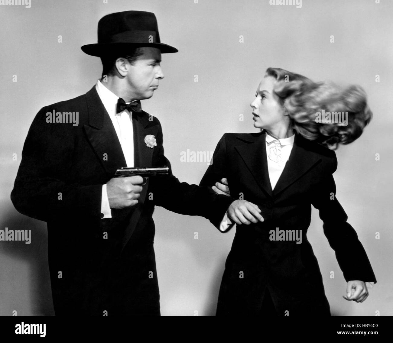 JOHNNY O'CLOCK, from left, Dick Powell, Evelyn Keyes, 1947 Stock Photo ...