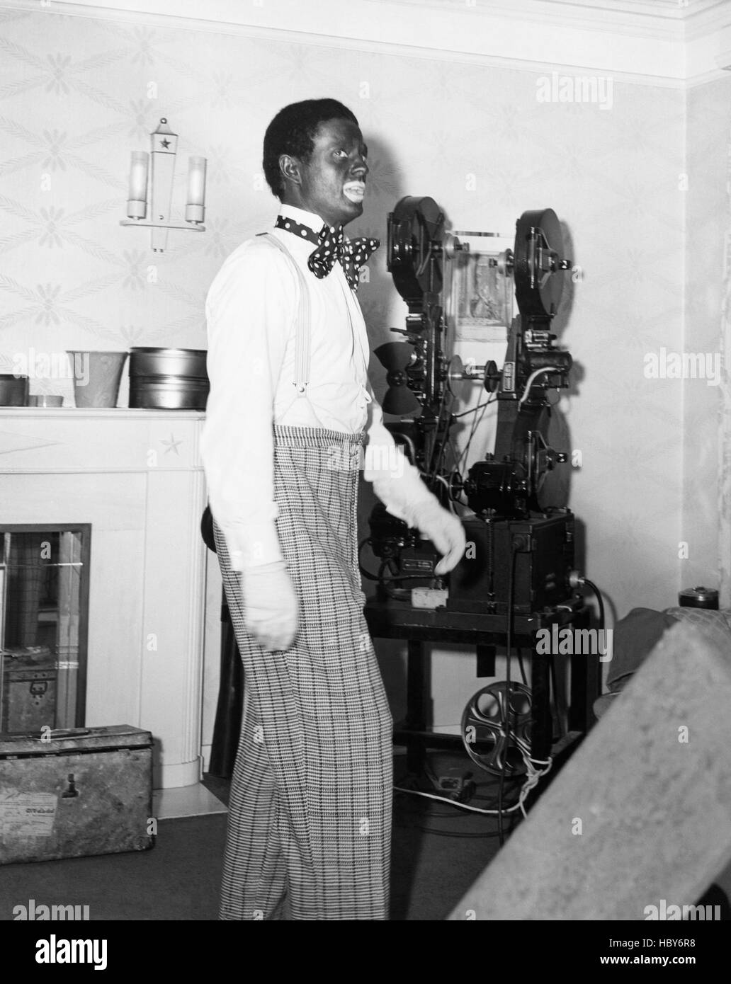 THE JOLSON STORY, Larry Parks rehearses in his dressing room while ...