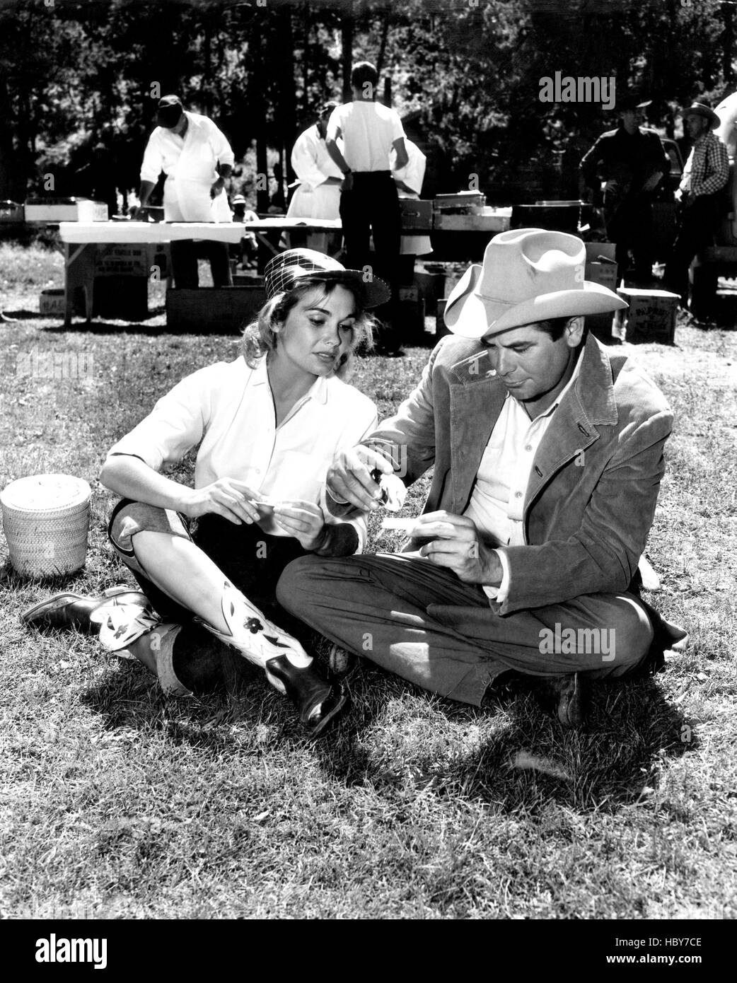 JUBAL, Felicia Farr, Glenn Ford, rolling cigarettes while on location ...